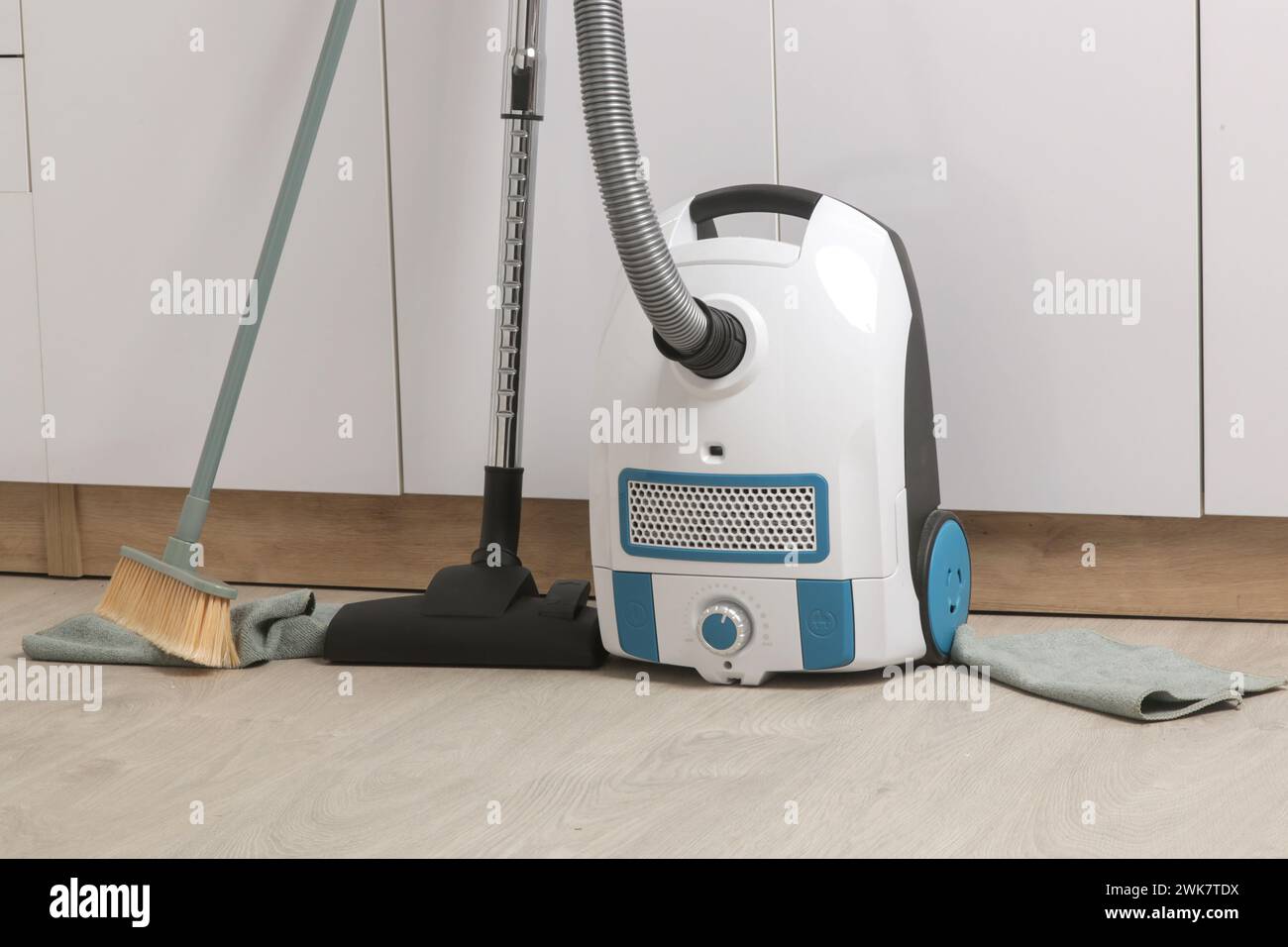 Small and simple vacuum cleaner in the apartment Stock Photo - Alamy