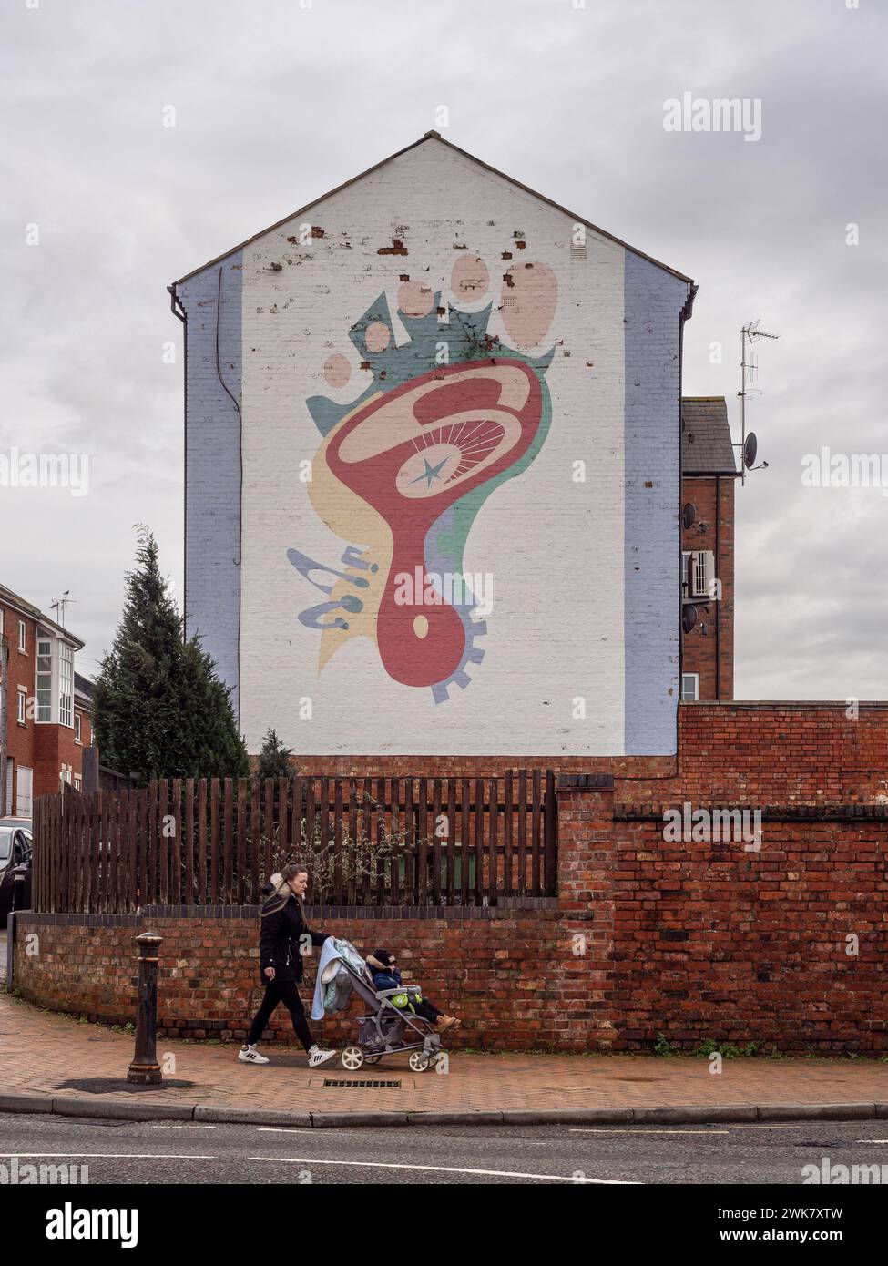 Huge mural of the sole of a foot on the side of an old factory ...