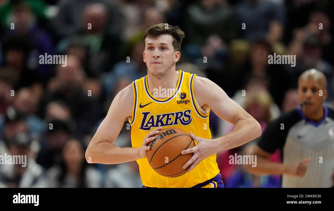 Los Angeles Lakers guard Austin Reaves (15) brings the ball up court ...