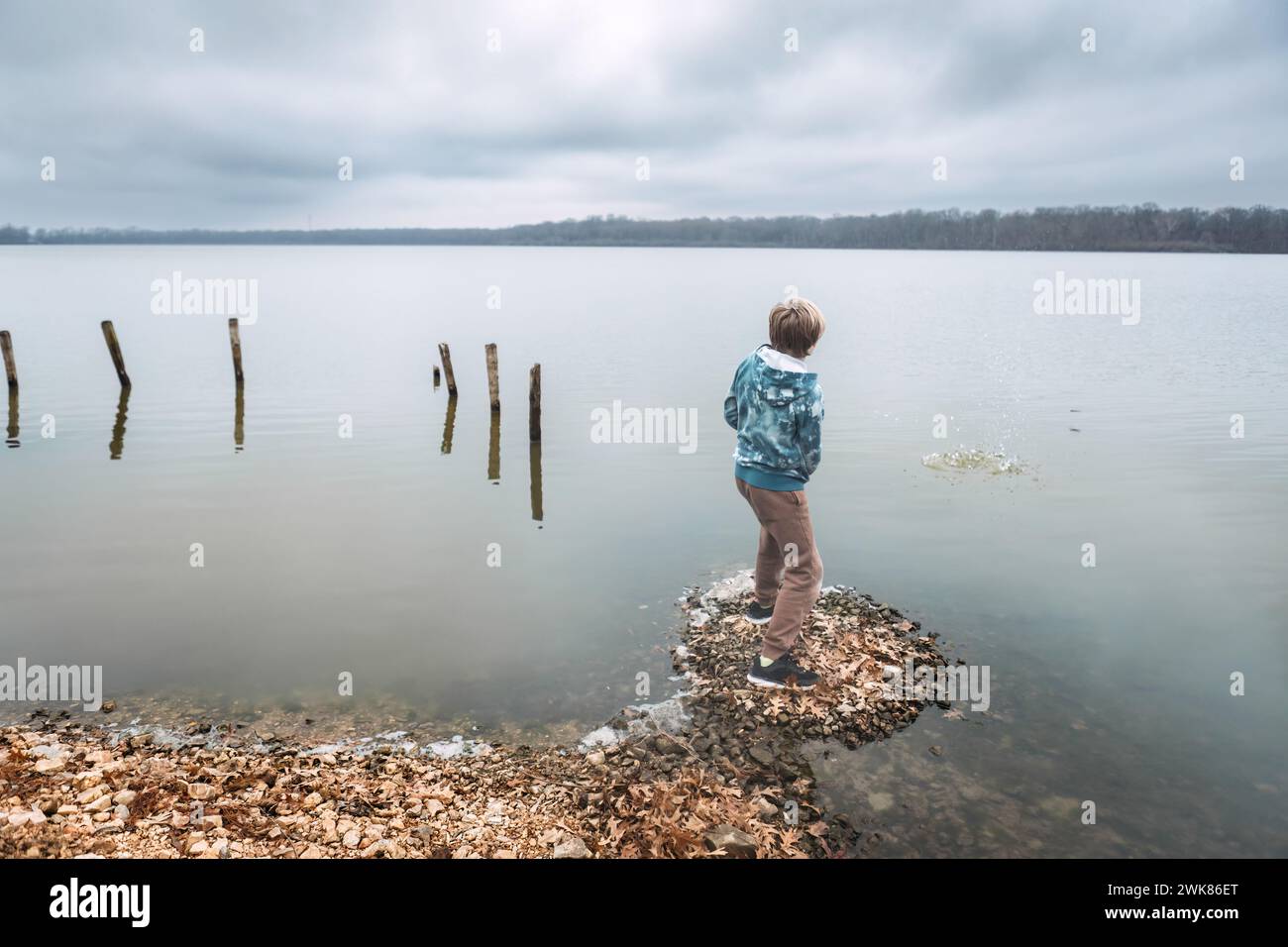 Child skipping rocks hi-res stock photography and images - Alamy