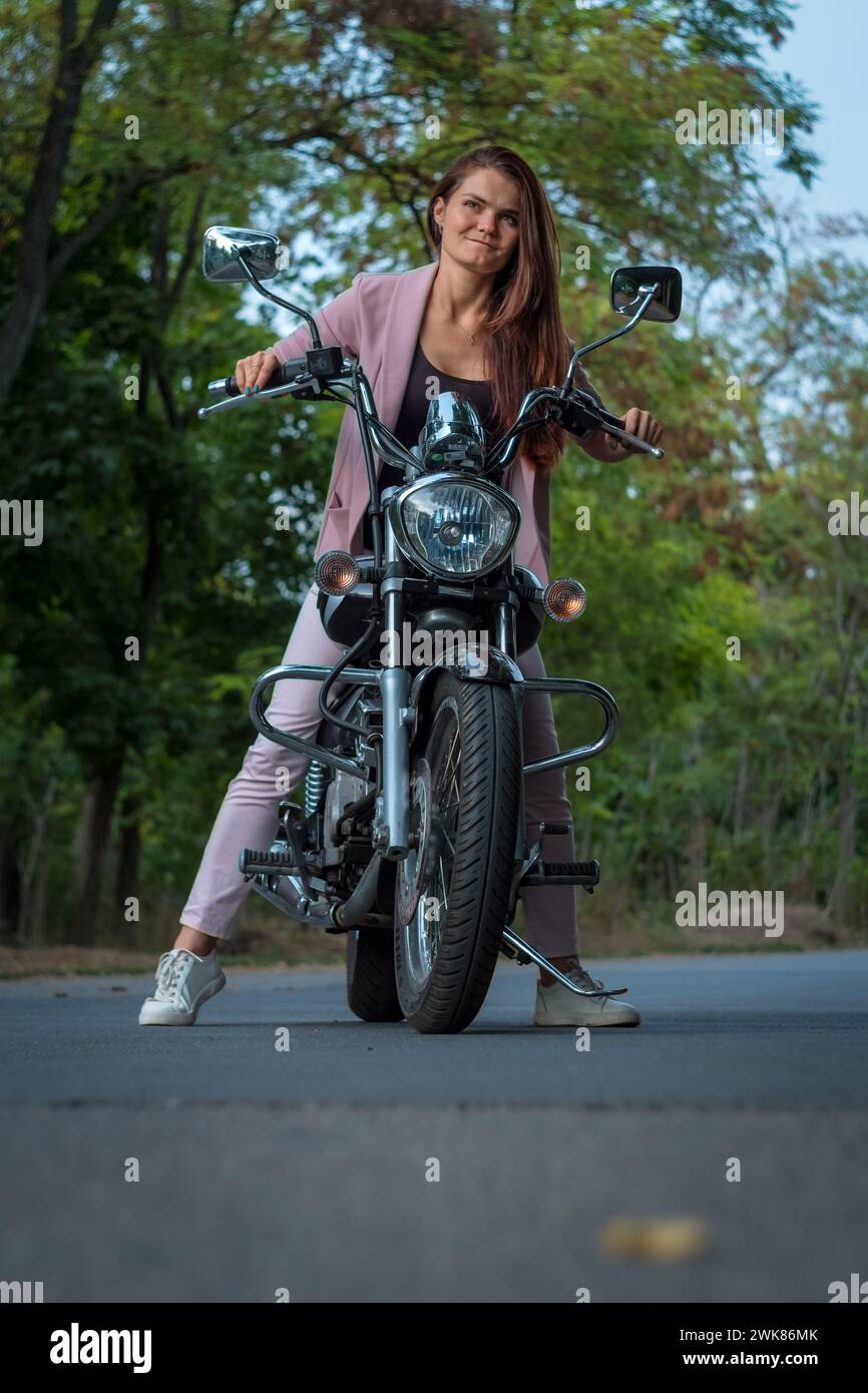 Posing with motorcycle hi-res stock photography and images - Alamy