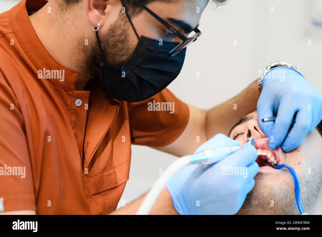 Expert dental whitening procedure in progress Stock Photo - Alamy