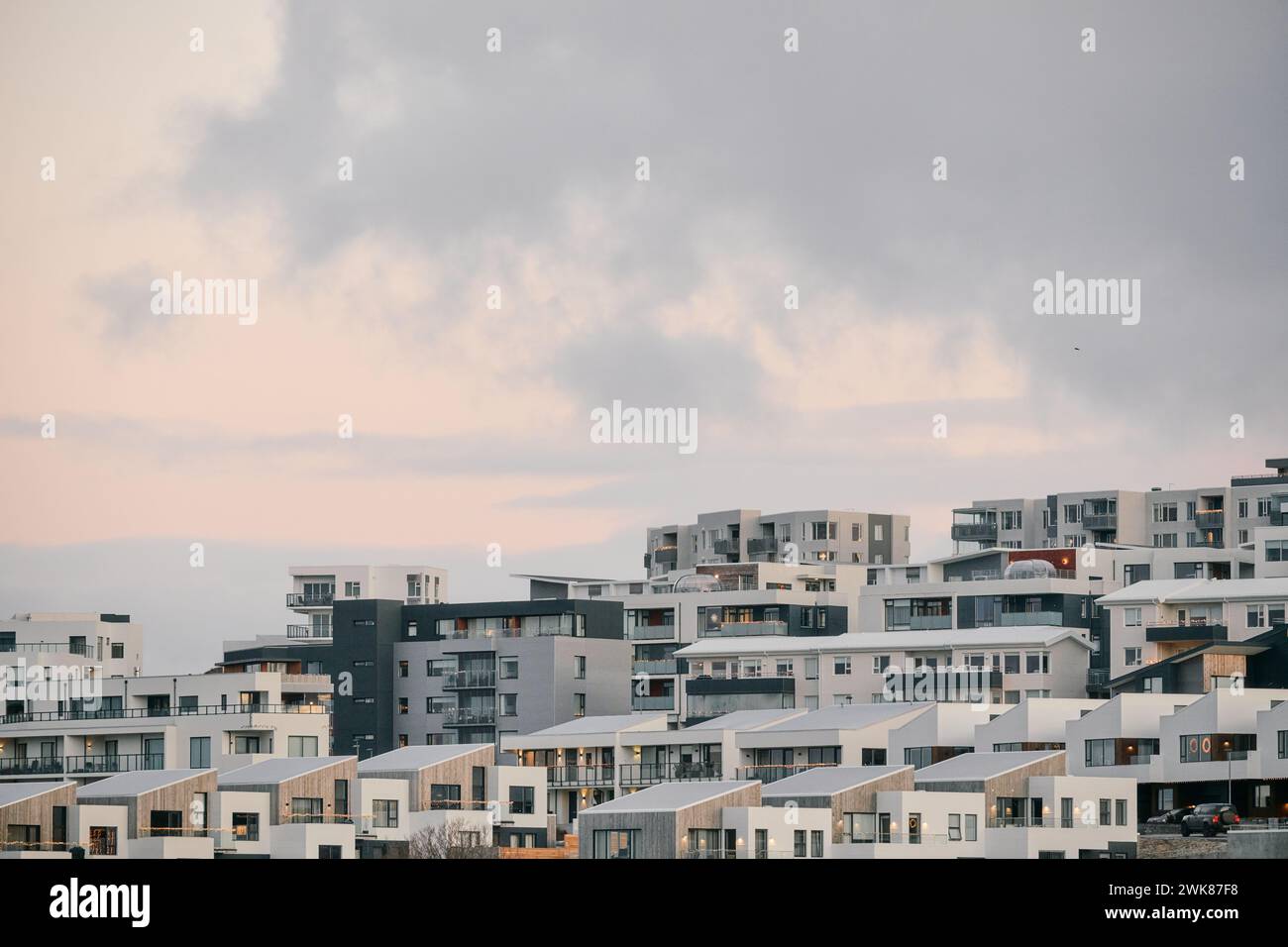 Buildings under cloudy sky hi-res stock photography and images - Alamy
