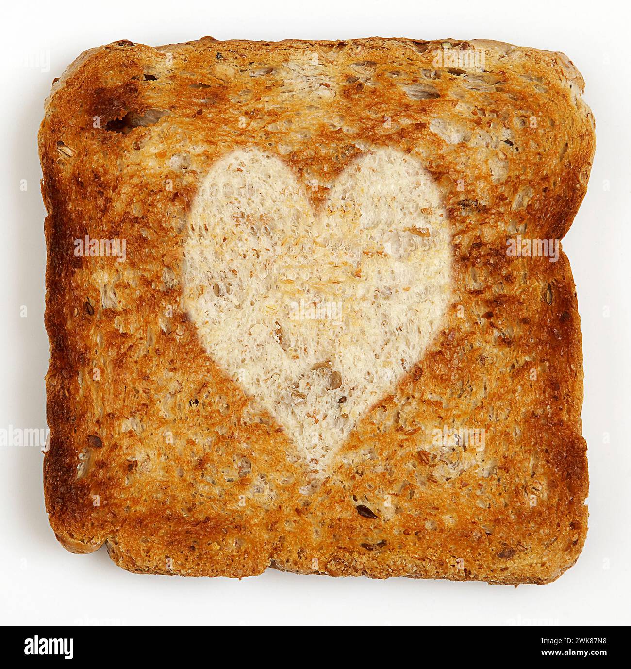 Slice of Toast with Heart Shape Stock Photo - Alamy