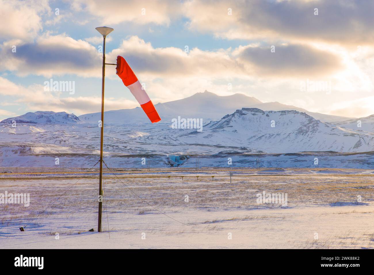 Windsock in winter landscape on an airfield Stock Photo - Alamy