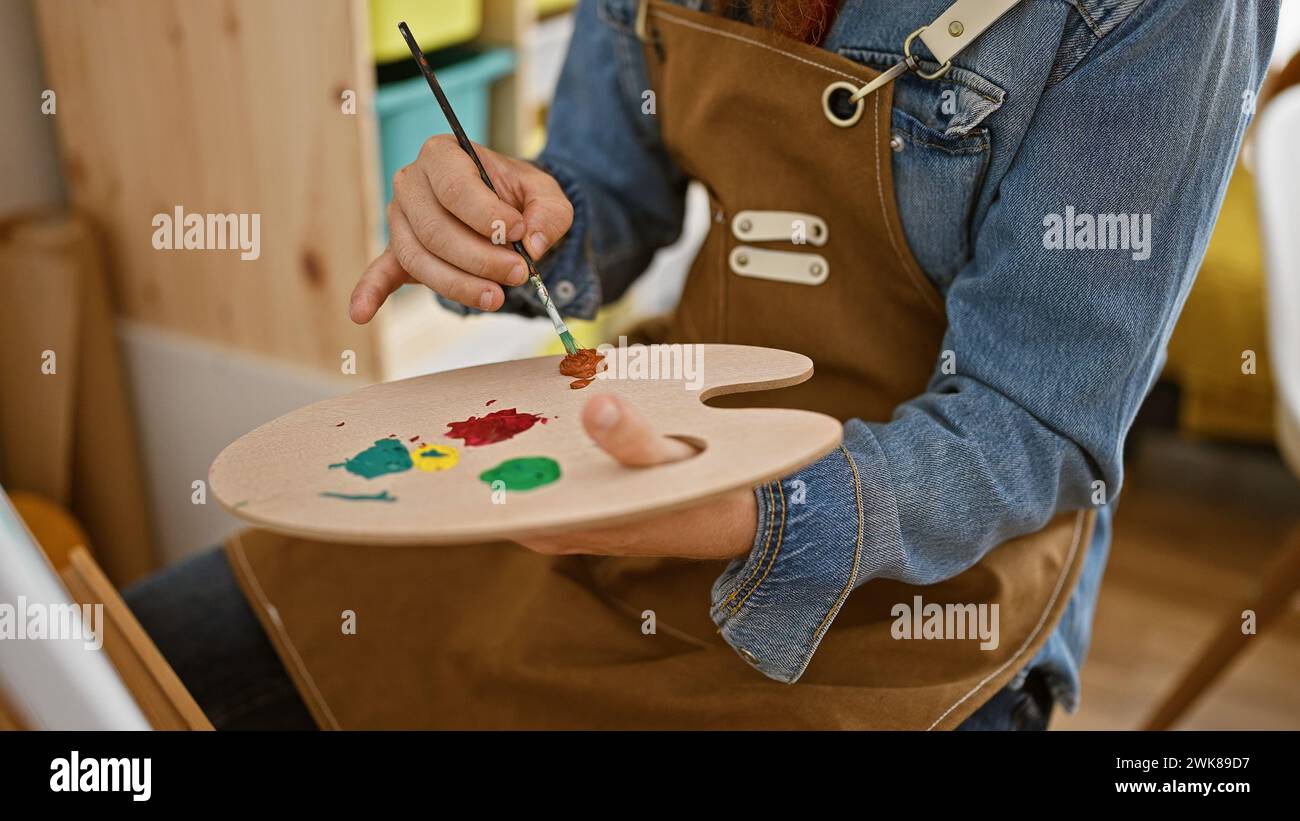 Captivating interior of art studio, man artist's hands drawing on ...