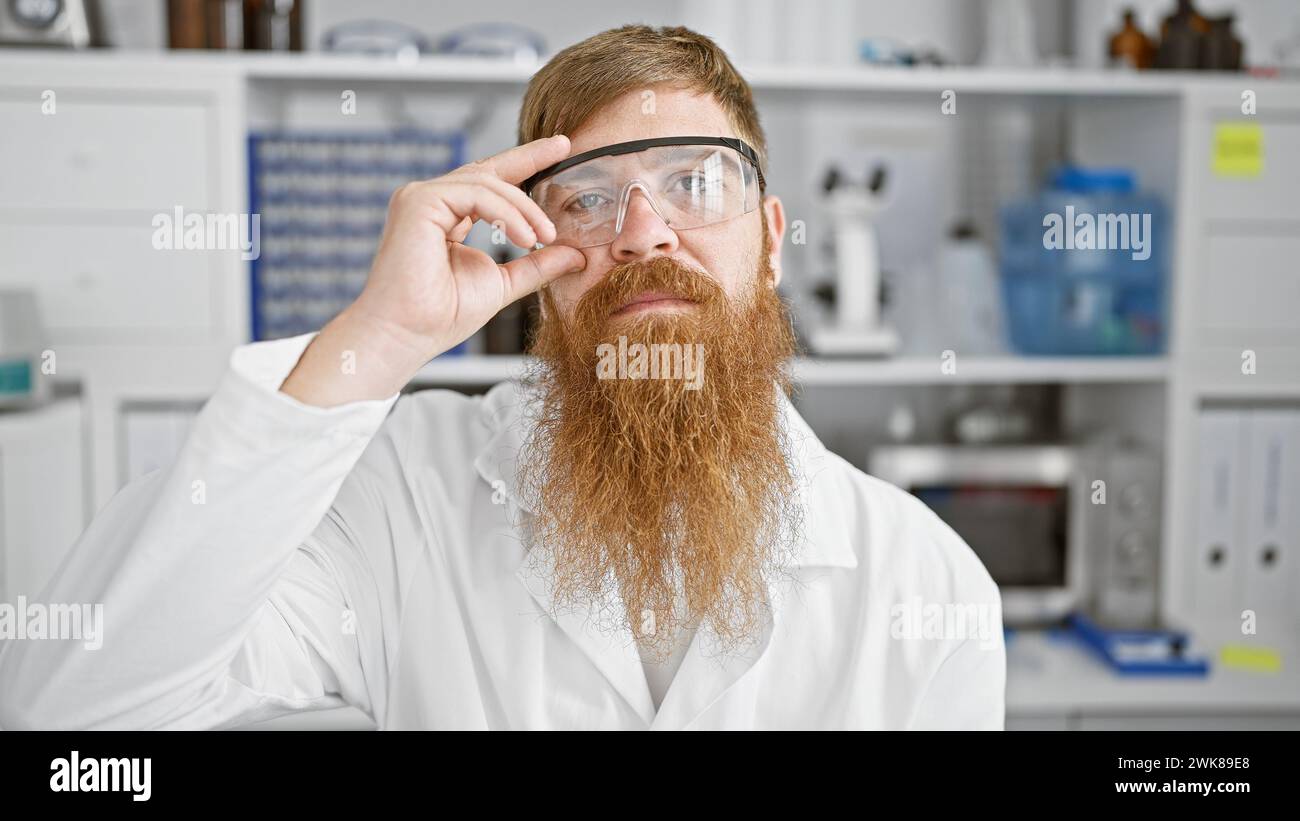 Relaxed yet serious-faced, young redhead male scientist, amped about a ...