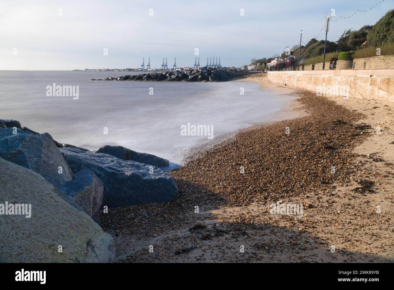 View along the promenade at Felixstowe beach looking towards the port ...