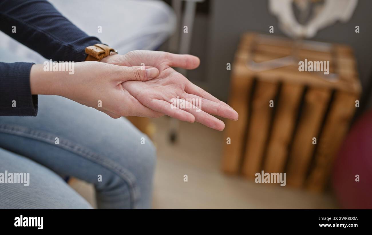 Close-up of a woman's outstretched hands in a therapy session ...