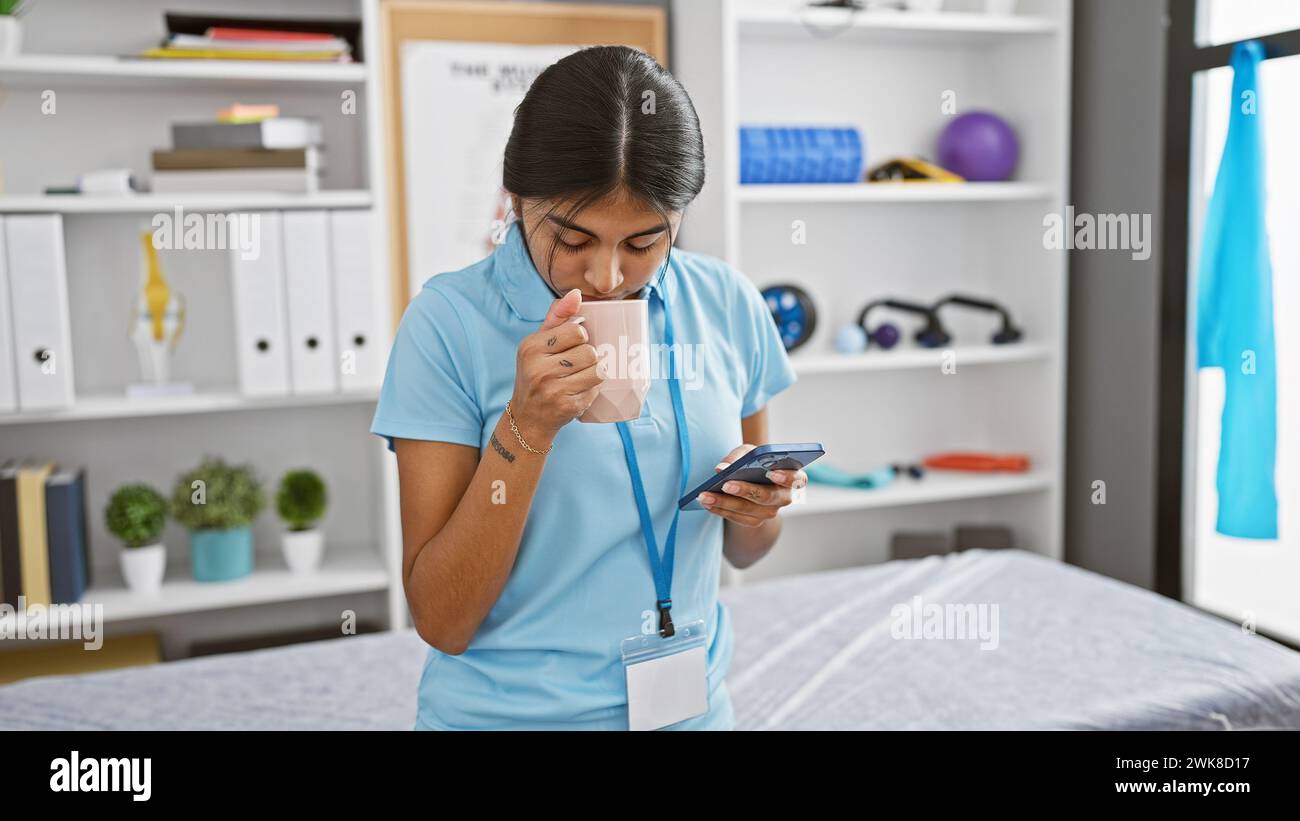 Indian woman healthcare professional drinking coffee and checking ...