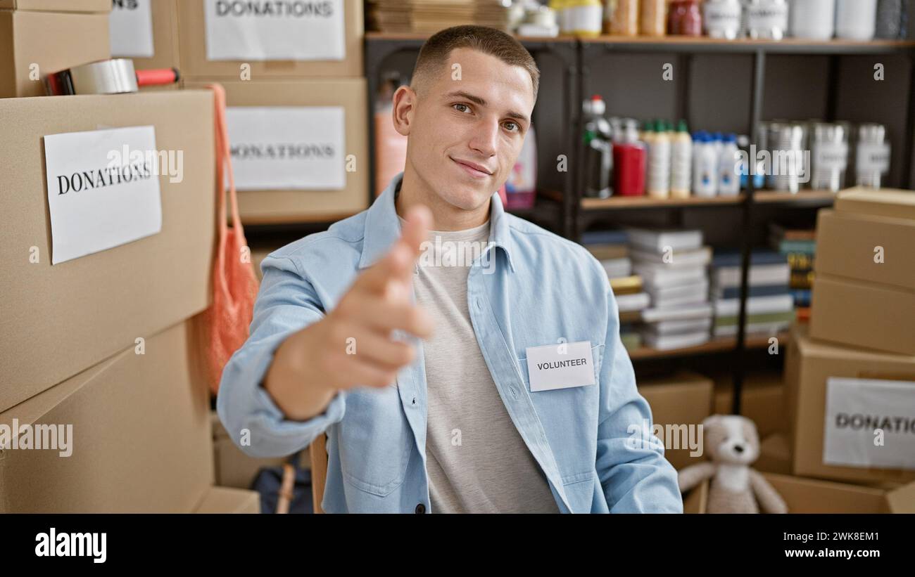 Man giving donation boxes hi-res stock photography and images - Alamy