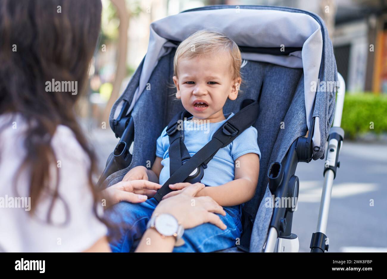 Sad mother baby stroller hi-res stock photography and images - Alamy