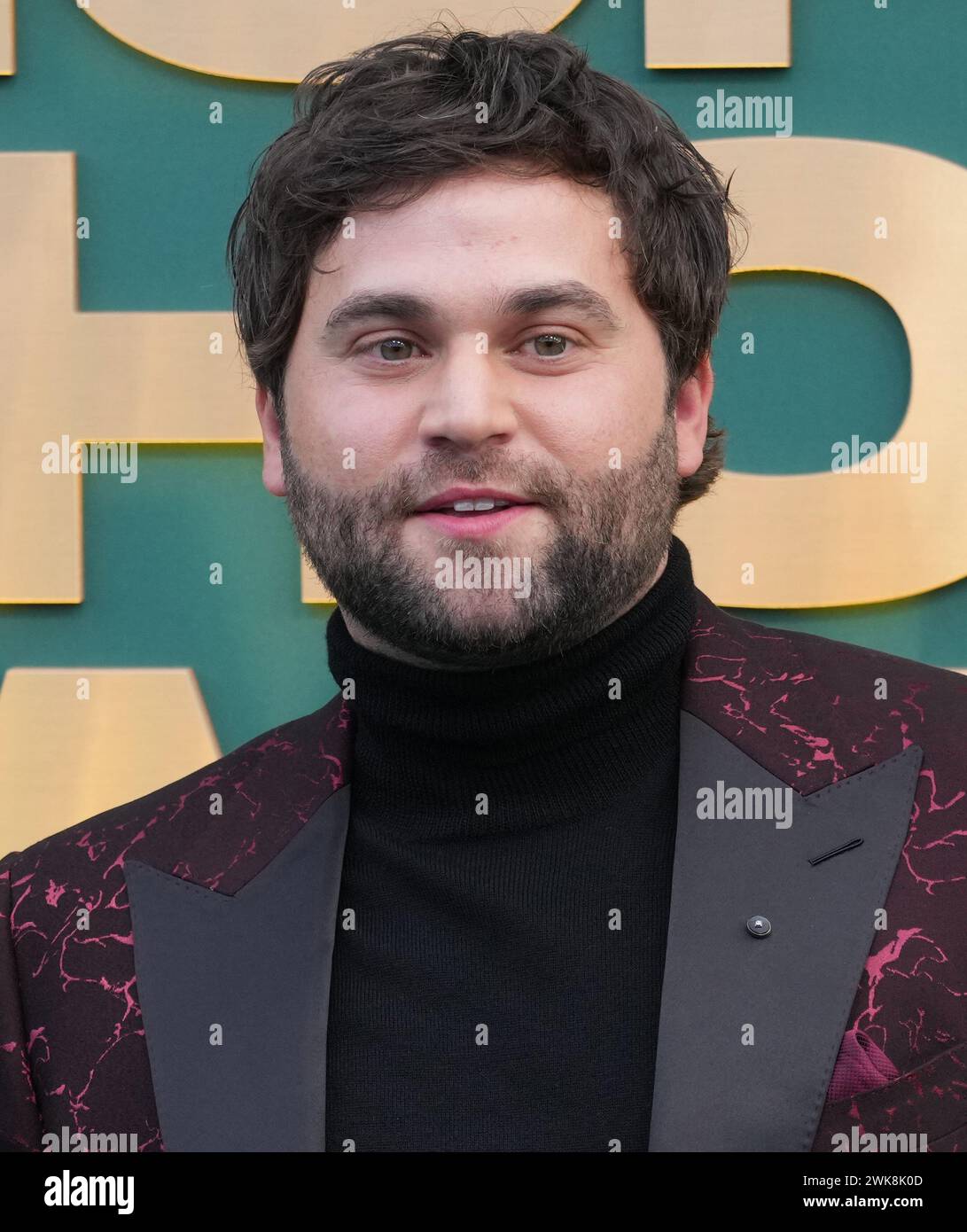 Los Angeles, USA. 18th Feb, 2024. Jake Borelli walking on the red ...