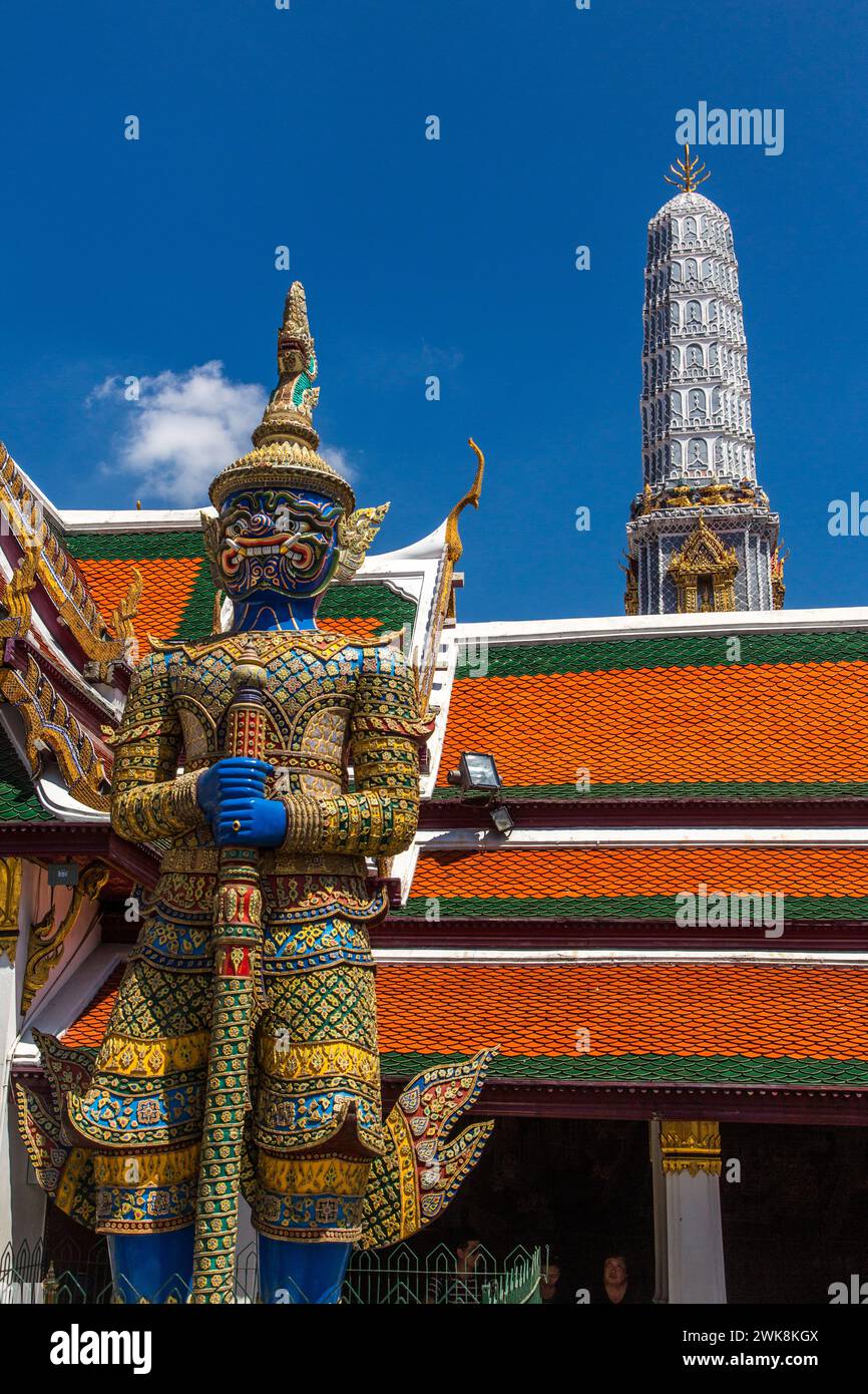 A yaksha guardian statue at the Temple of the Emerald Buddha complex in ...