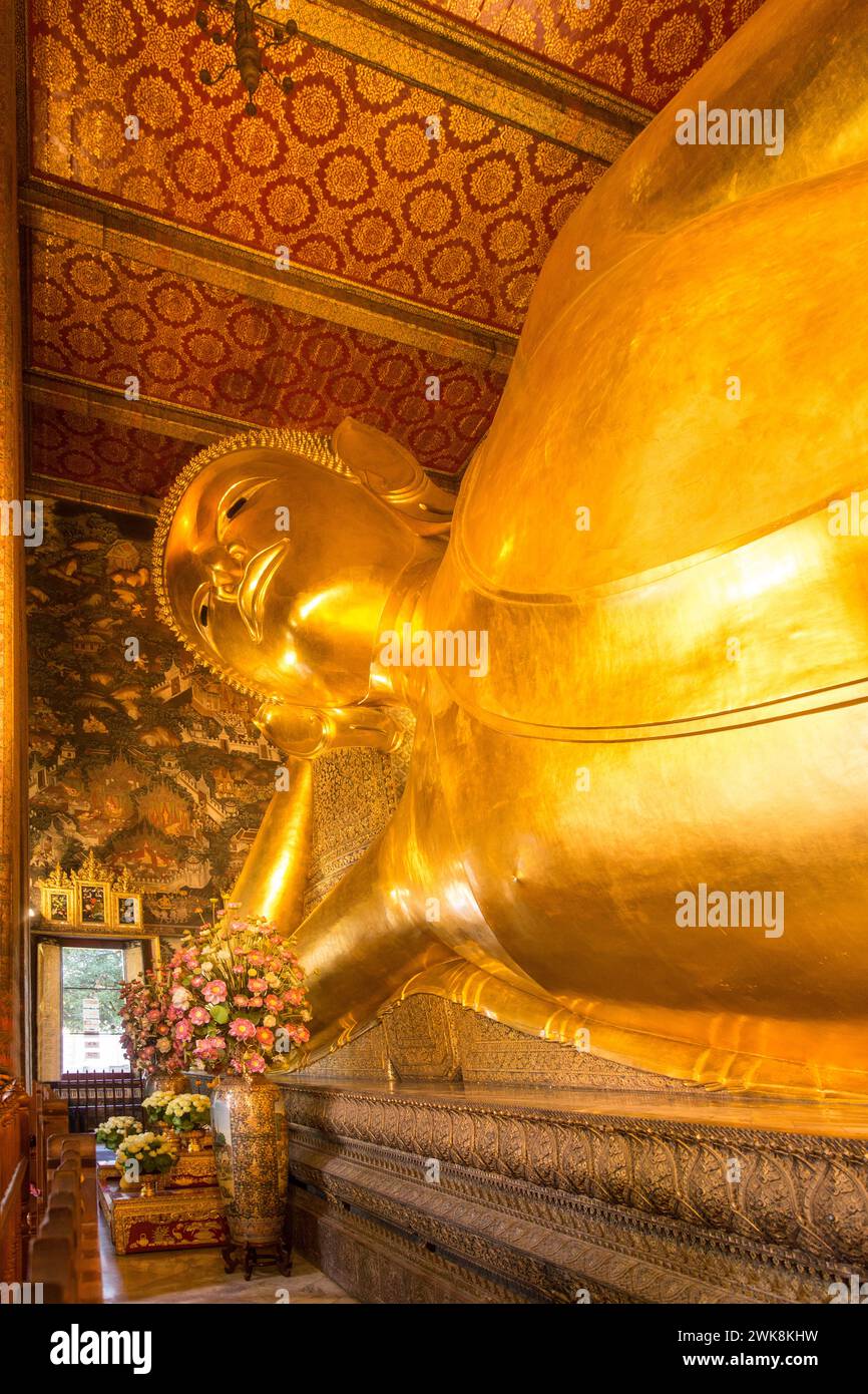 The giant Reclining Buddha statue, gilded with gold leaf, in the Wat Pho Temple in Bangkok ...