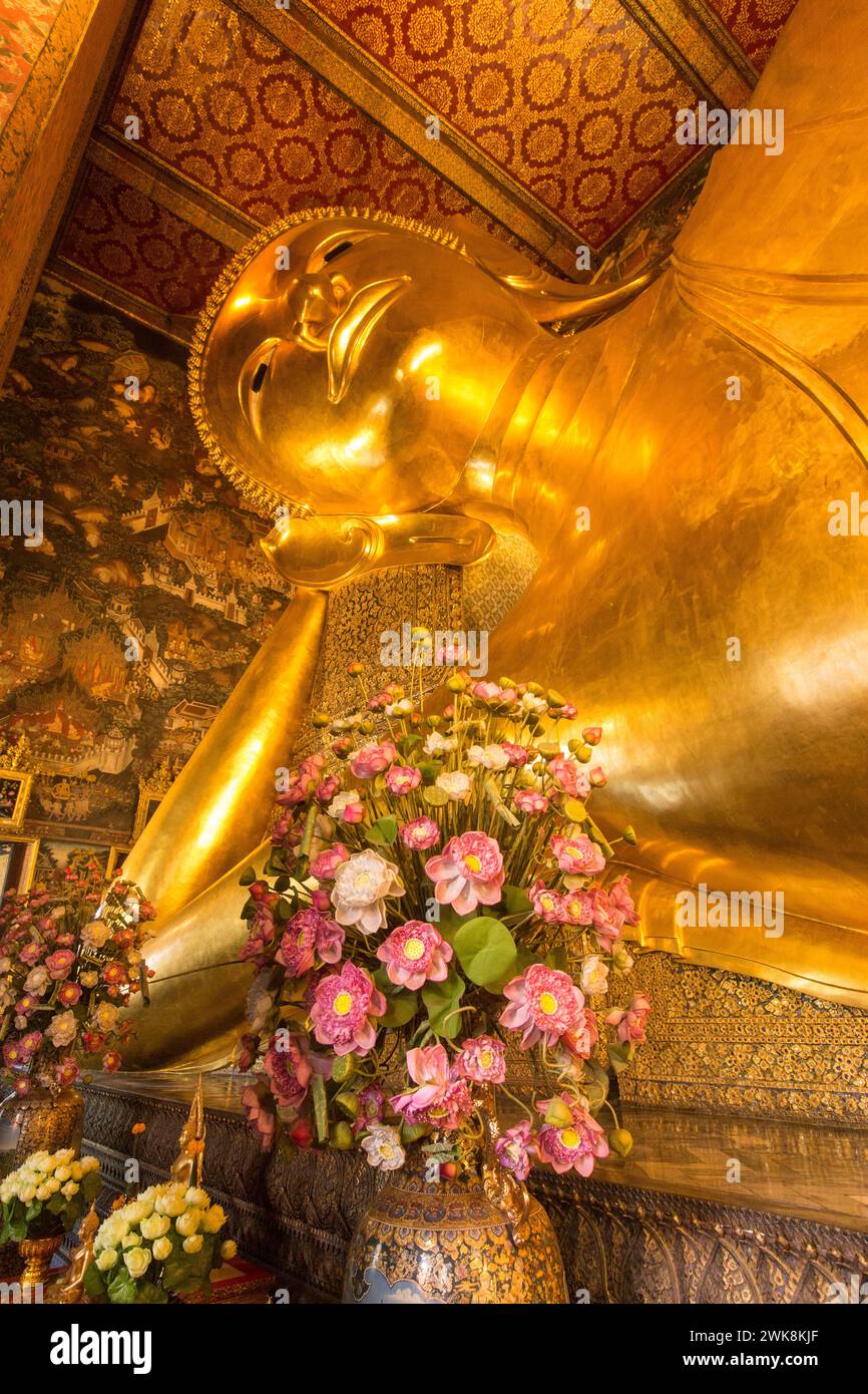 The giant Reclining Buddha statue, gilded with gold leaf, in the Wat Pho Temple in Bangkok ...