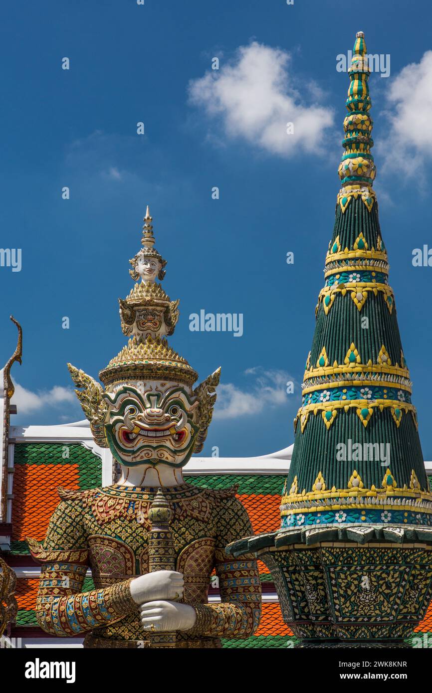 A yaksha guardian statue at the Temple of the Emerald Buddha complex in ...