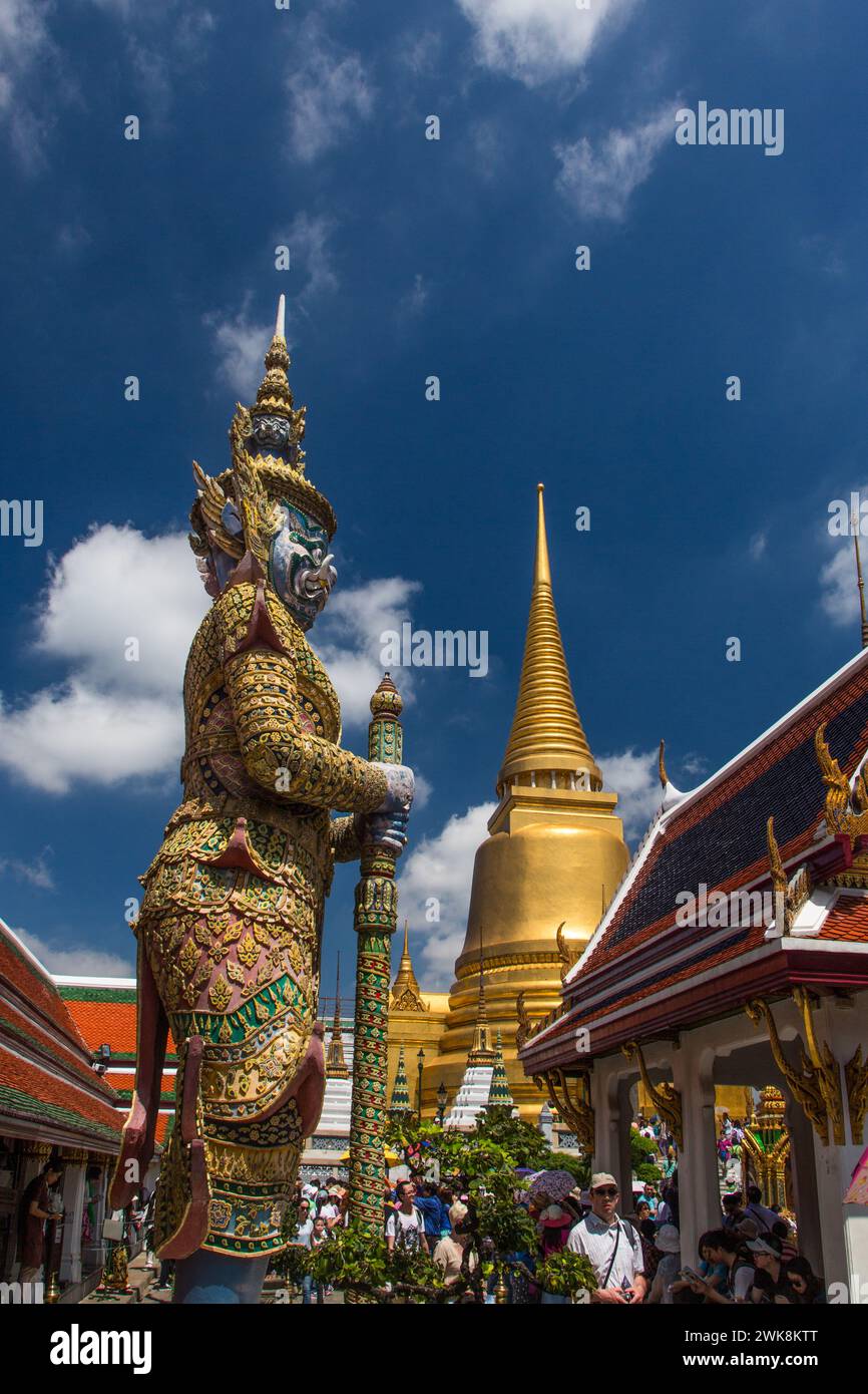 A yaksha guardian statue at the Temple of the Emerald Buddha complex in ...