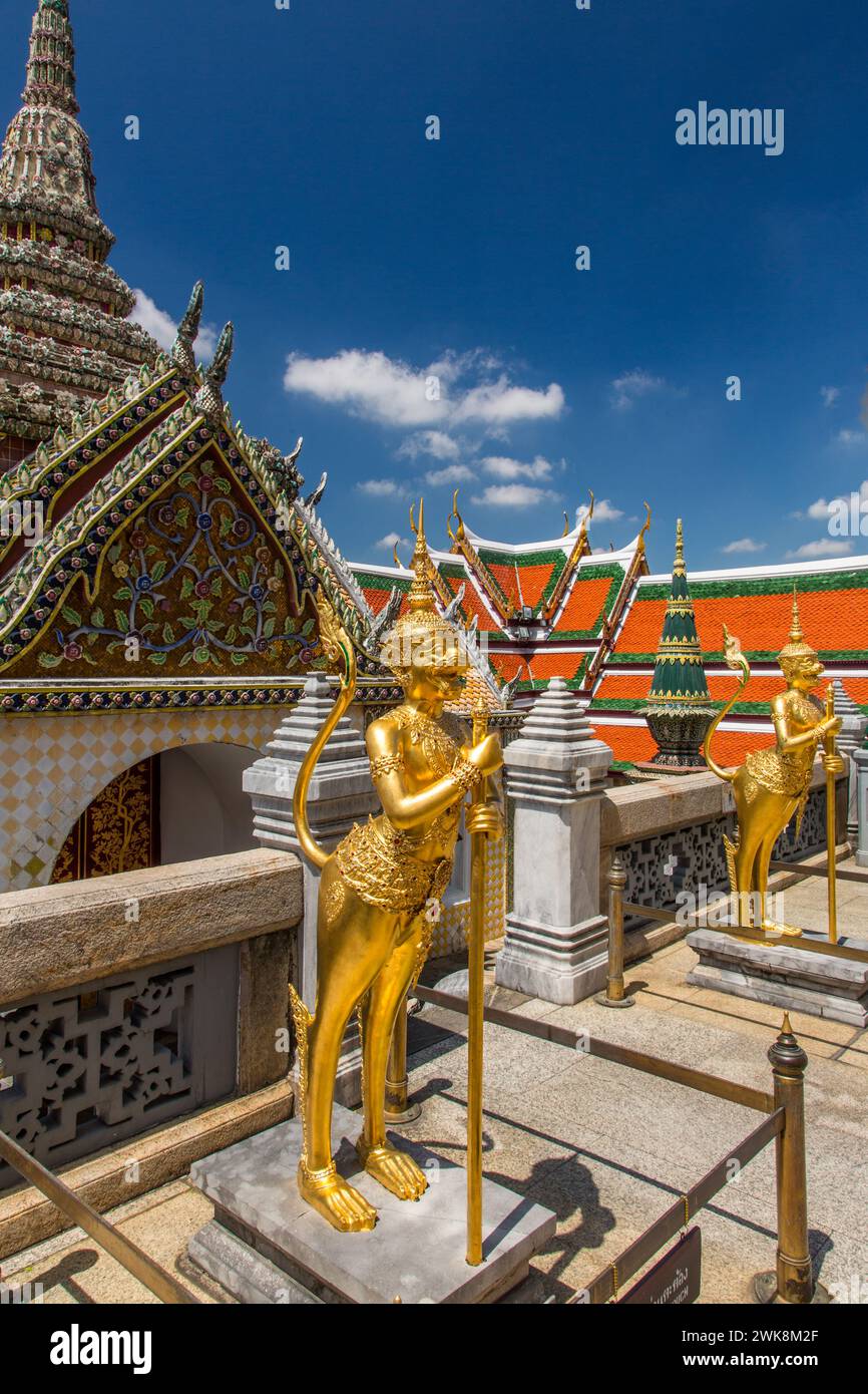 Golden statue of a Singhaphanon mythical creature guards the Phra ...
