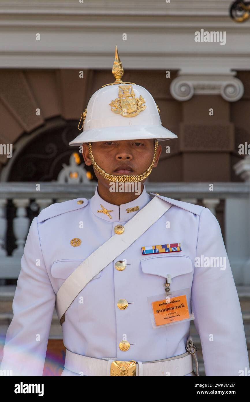 A Thai soldier in ceremonial uniform on duty at the Grand Palace ...