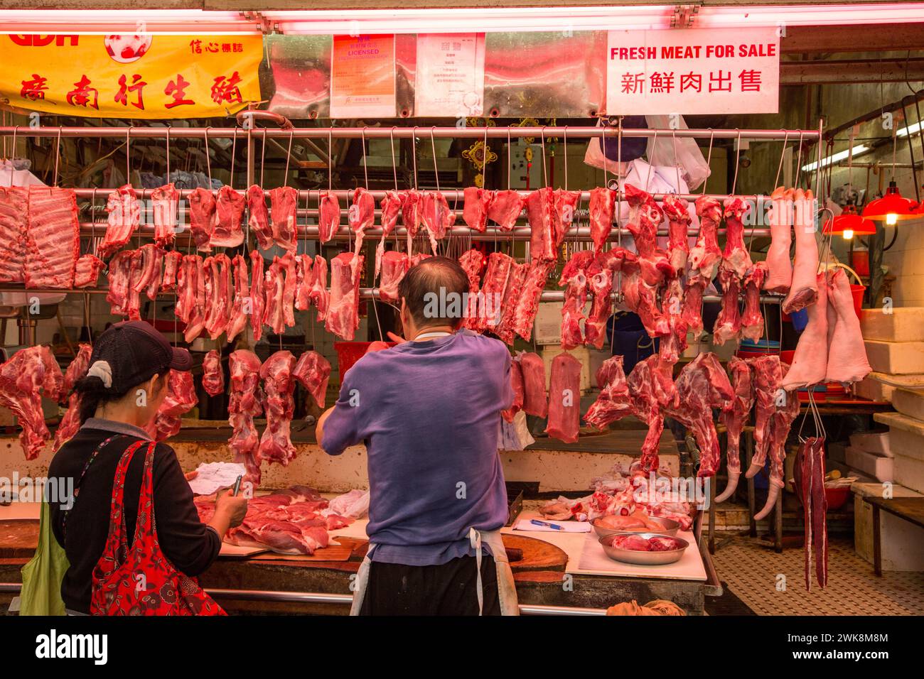 Meet for sale in a butcher shop on the street in Hong Kong, China Stock ...