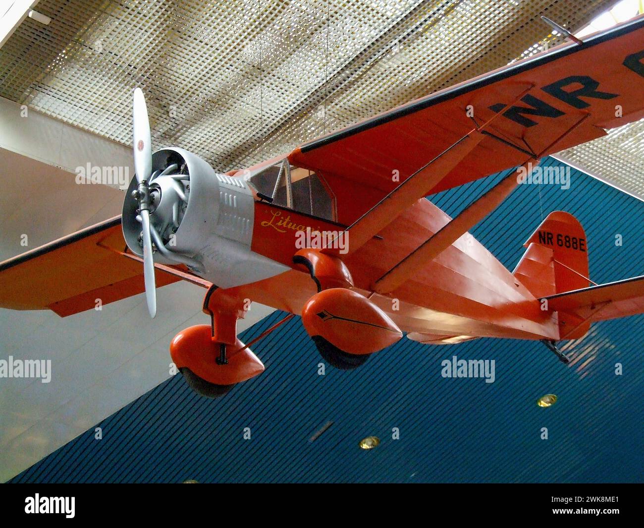 A reproduction of the 'Lituanica' hanging from the ceiling of the older ...