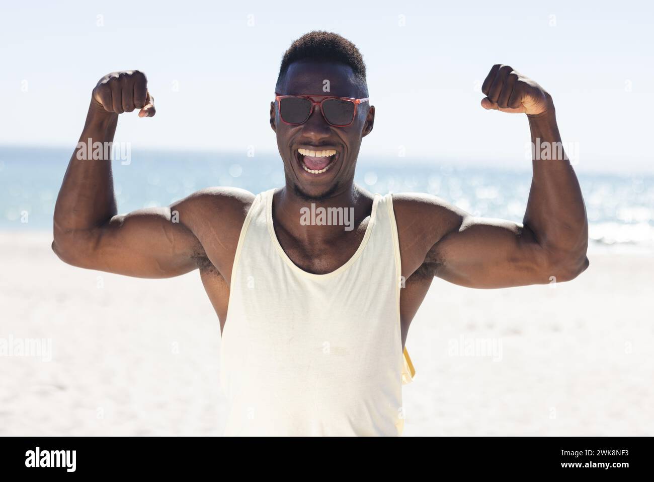 Strong man flexes muscles hi-res stock photography and images - Alamy