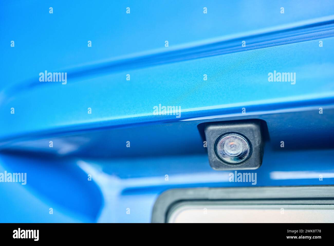 Luxury blue car rear view camera for parking assistance selective focus ...