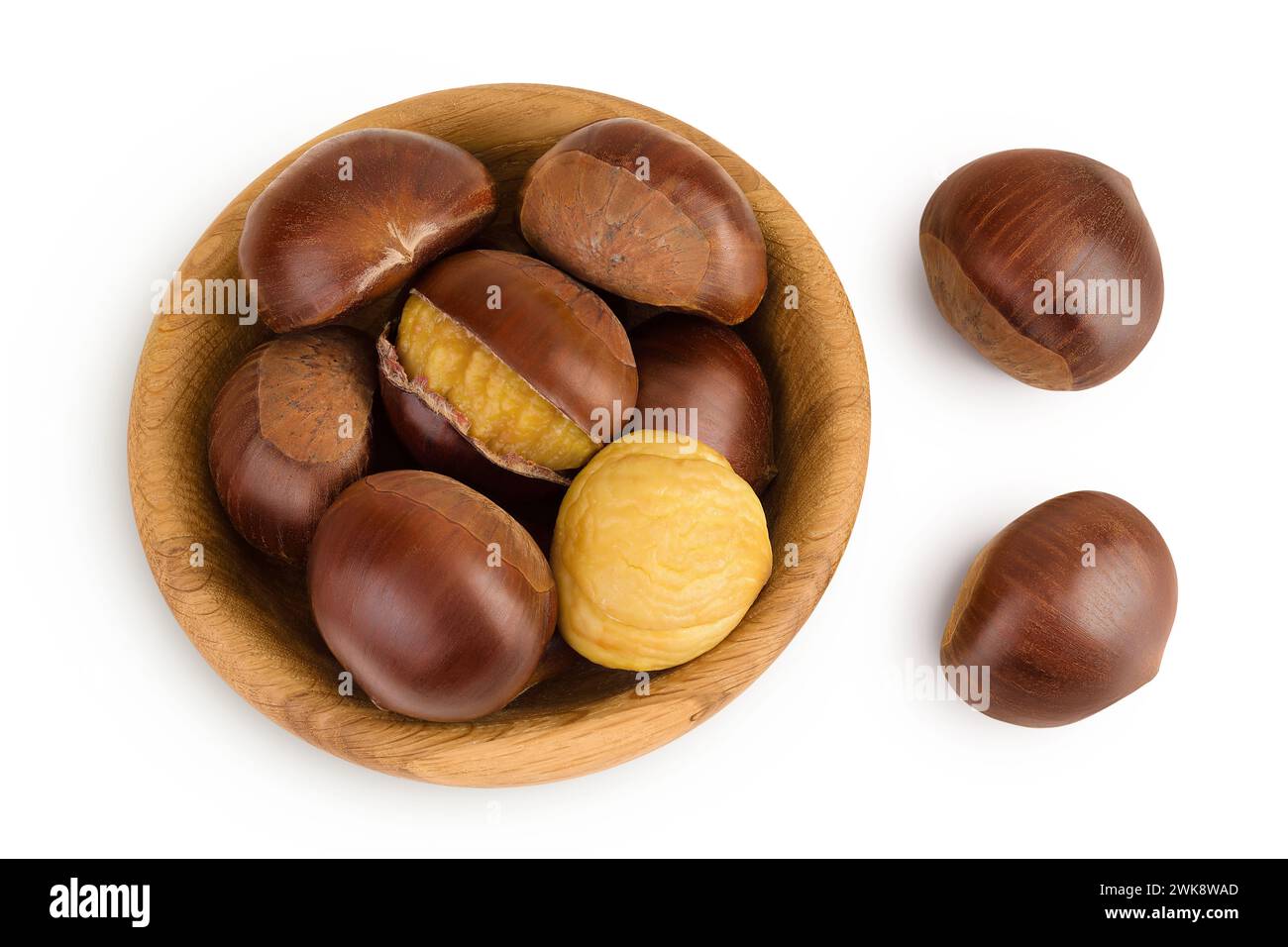 roasted peeled chestnut in wooden bowl isolated on white background wit ...
