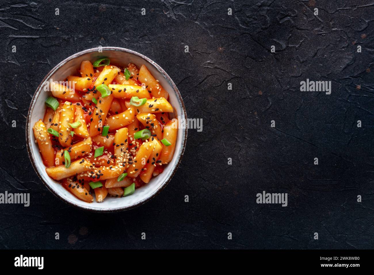 Tteokbokki or topokki, Korean street food, spicy rice cakes in red ...