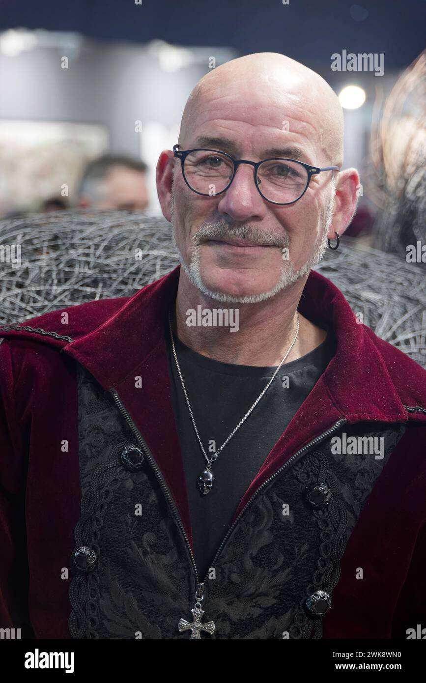 Paris, France. 17th Feb, 2024. Artist Emmanuel Guillon poses next to ...