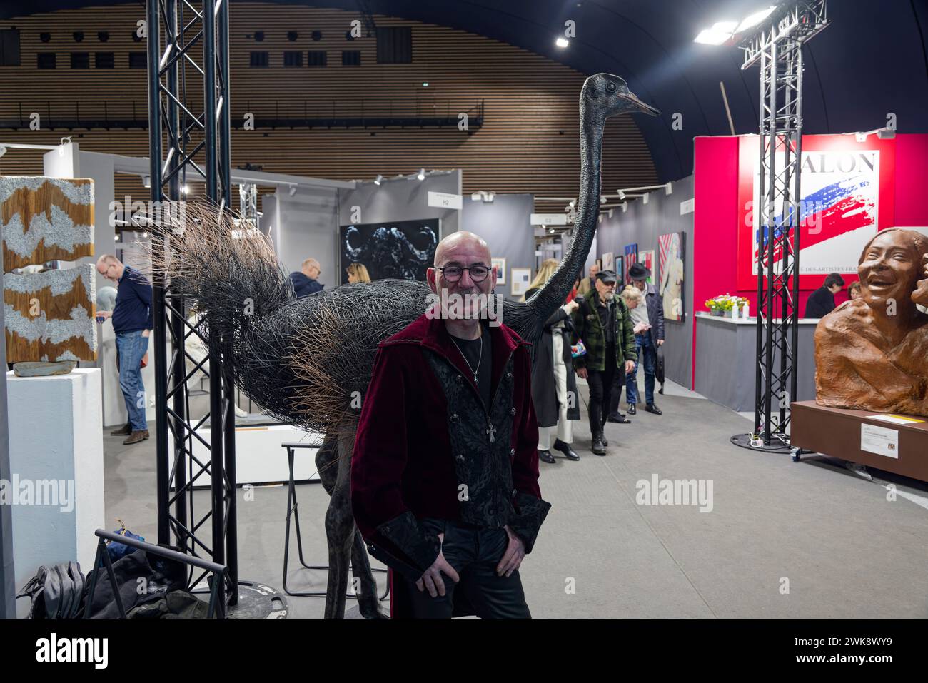 Paris, France. 17th Feb, 2024. Artist Emmanuel Guillon poses next to ...