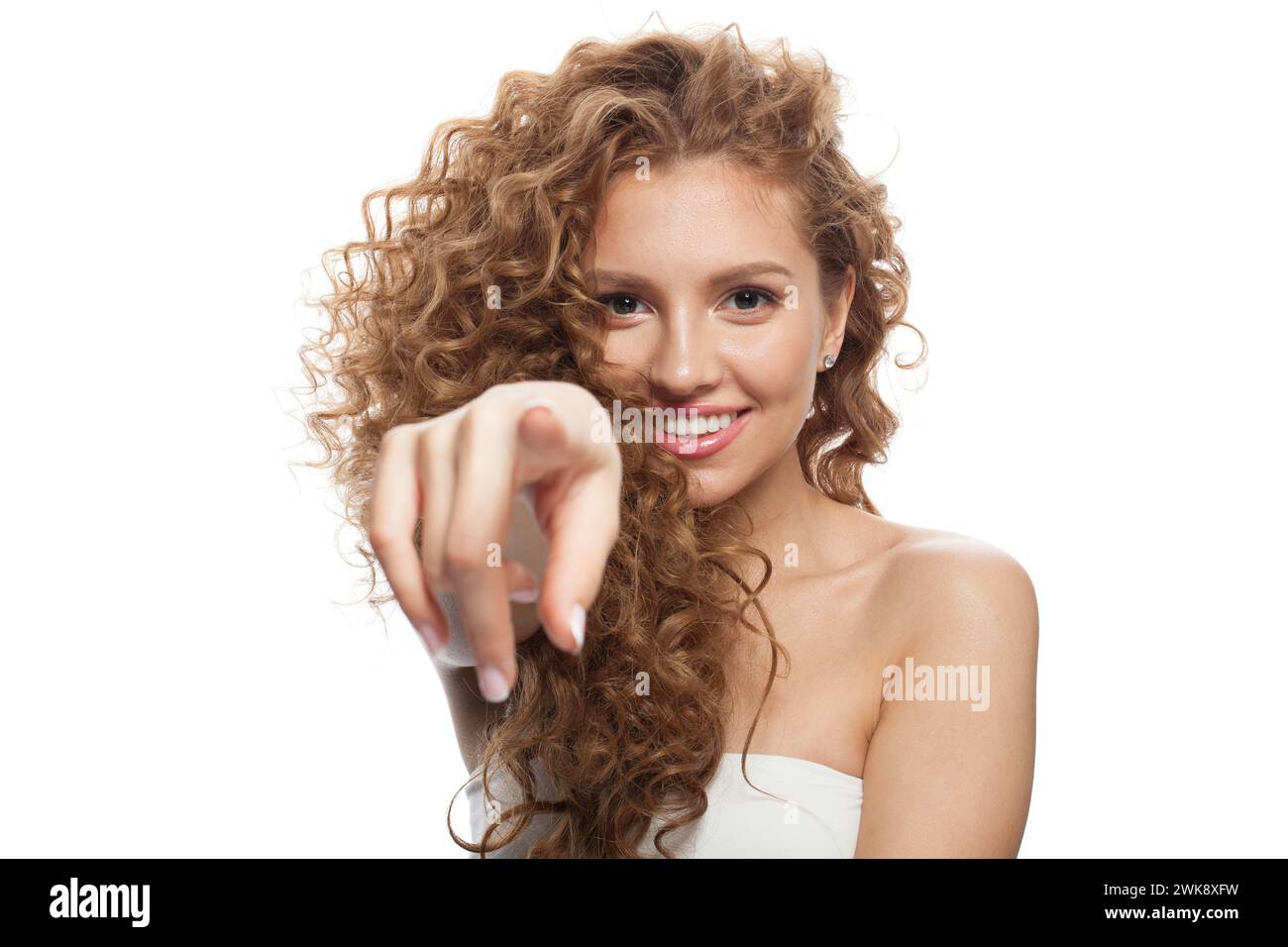 Isolated woman pointing finger. Beautiful female model with natural ...