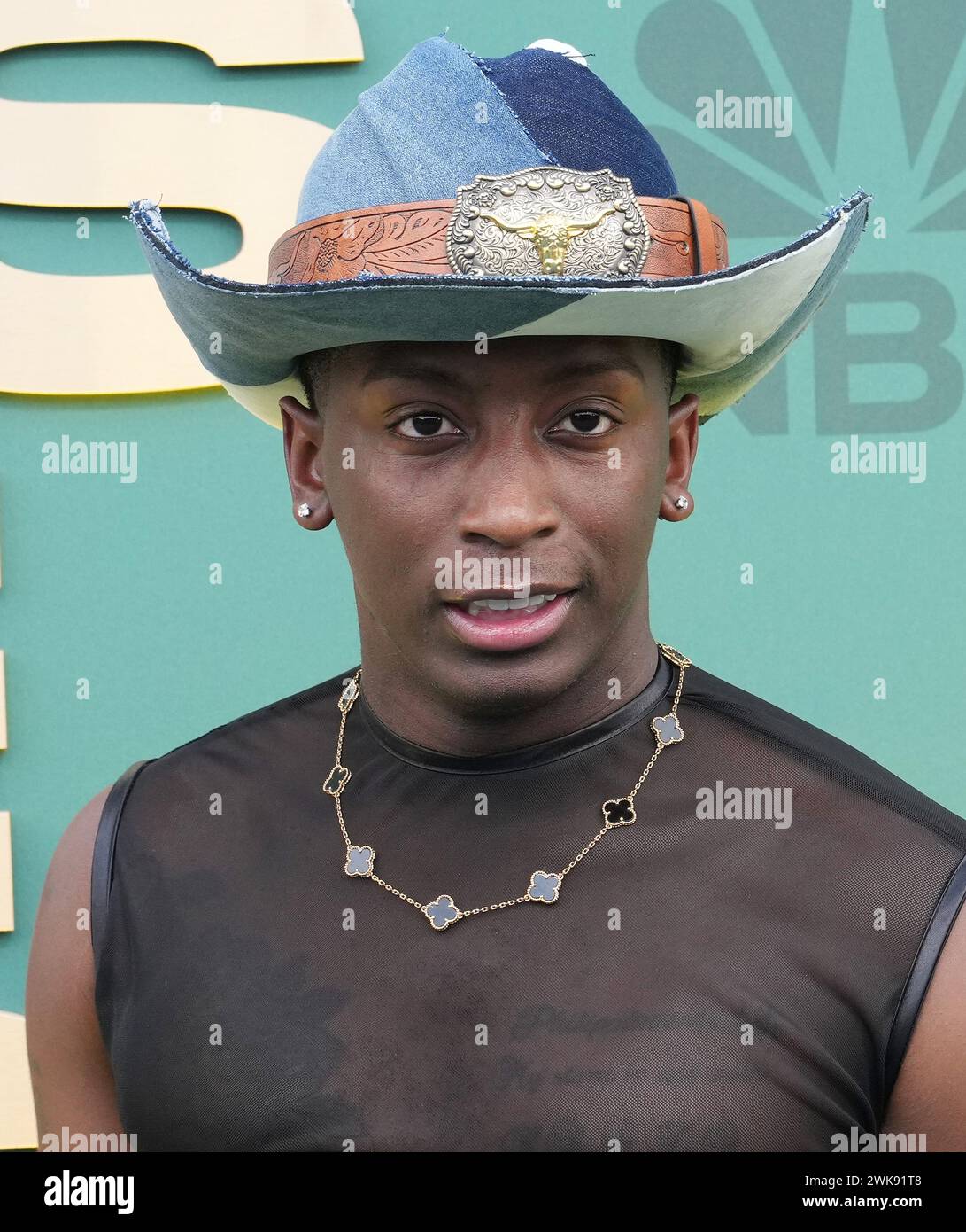 Los Angeles, USA. 18th Feb, 2024. Markell Washington walking on the red ...