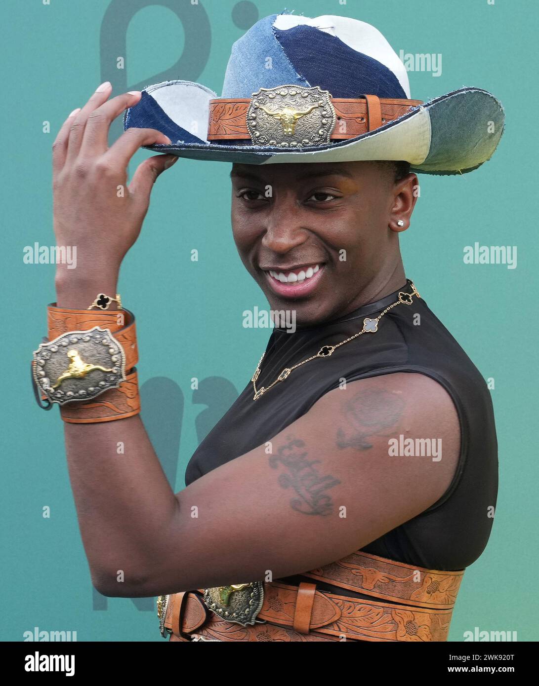 Los Angeles, USA. 18th Feb, 2024. Markell Washington walking on the red ...