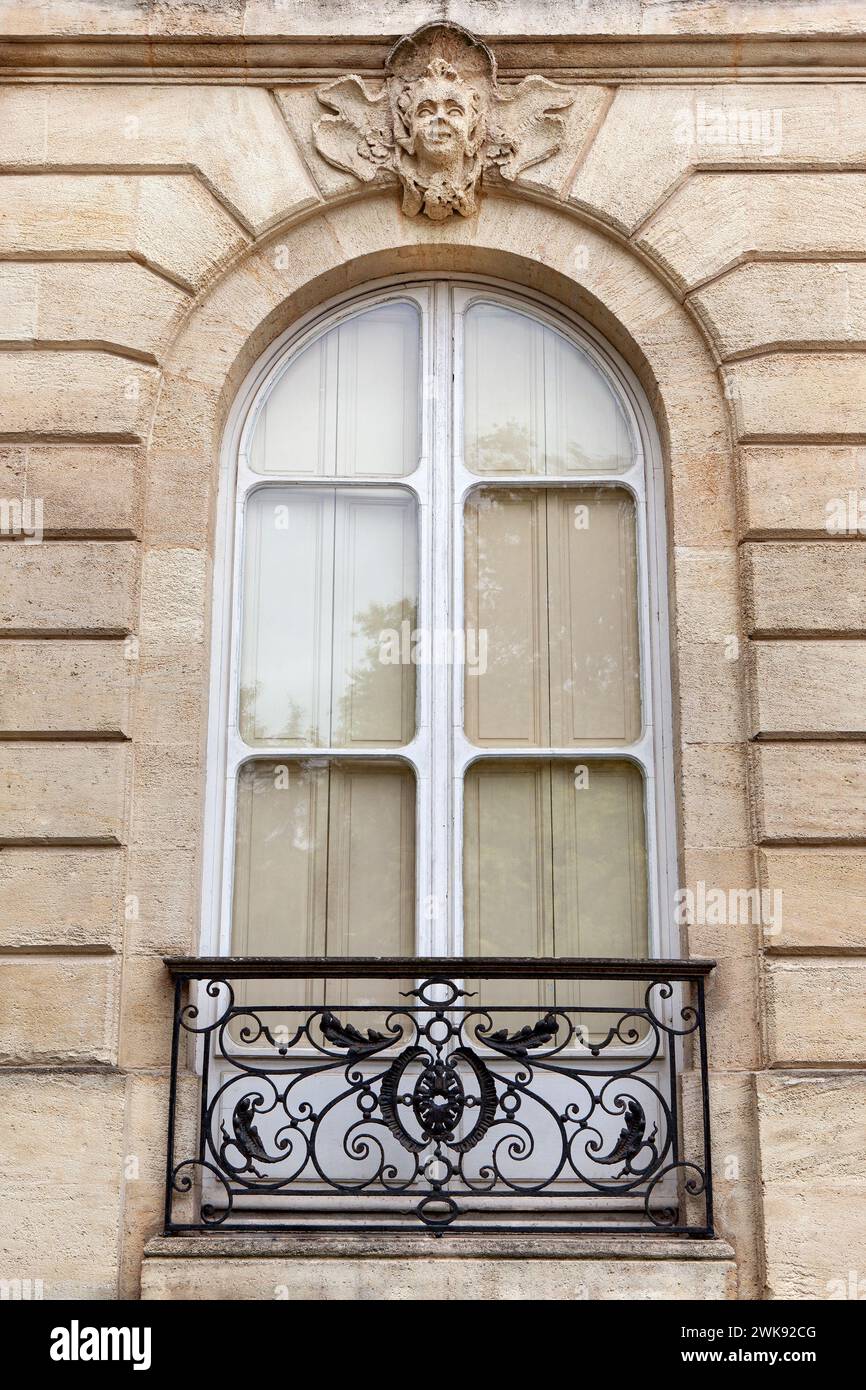 Window and wrought iron balcony Stock Photo - Alamy