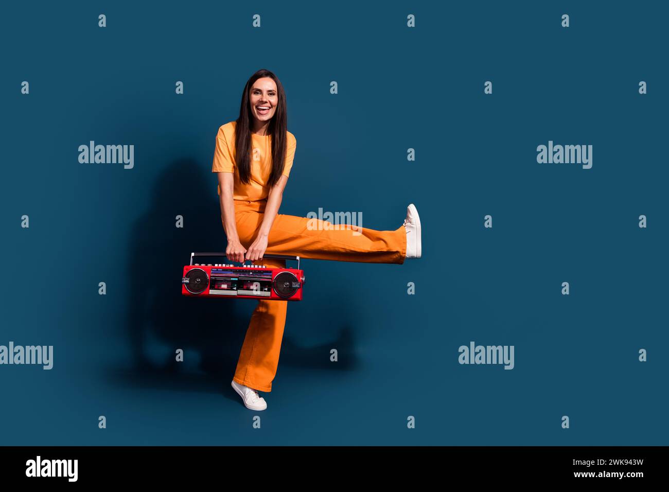 Full body photo of steps girl just bought retro nostalgia cassette ...