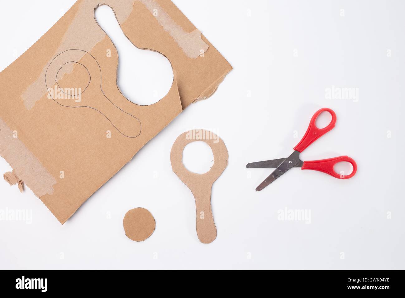 a cardboard magnifying glass craft for kids play, handmade loupe toy ...