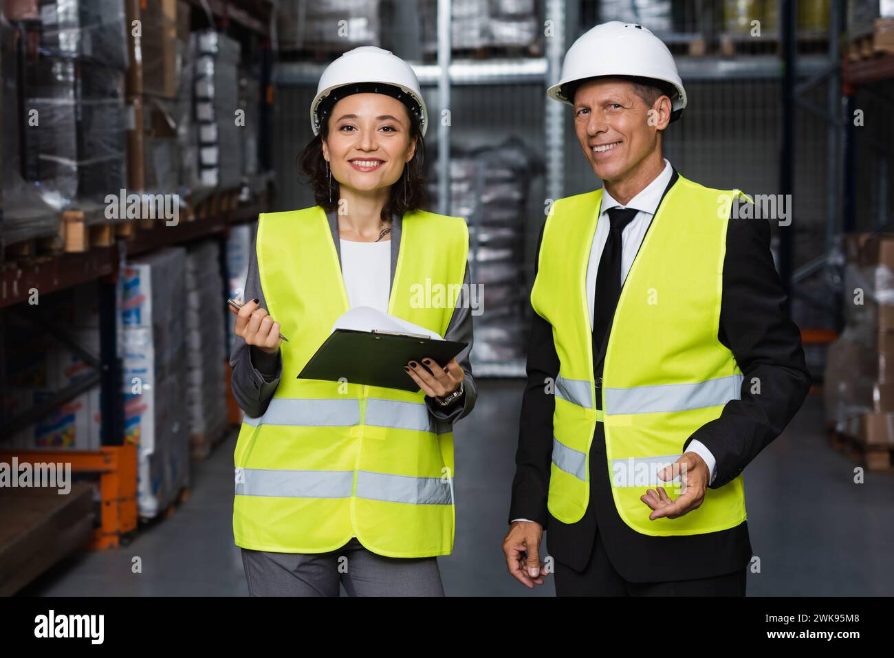 professional headshot, middle aged supervisor and female employee in ...
