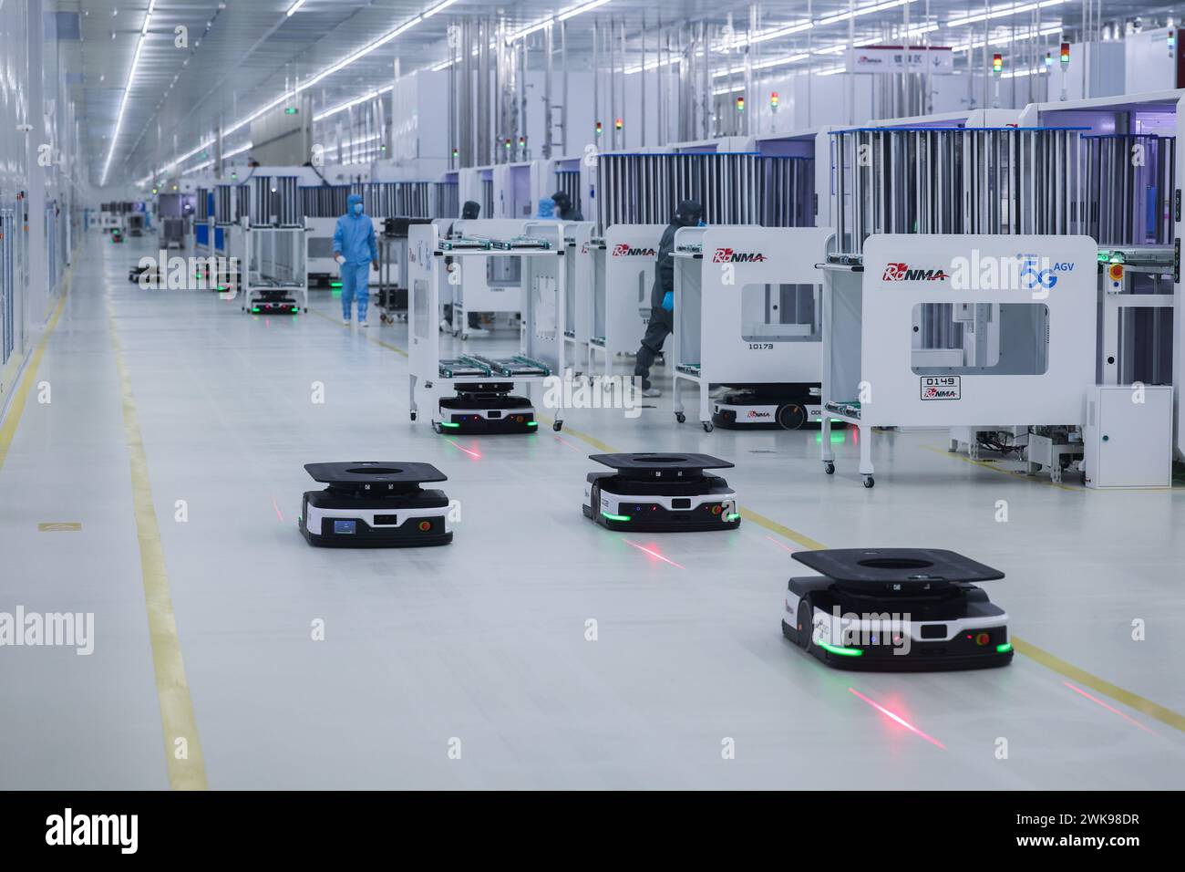 Jinhua, China's Zhejiang Province. 19th Feb, 2024. Smart robots operate ...