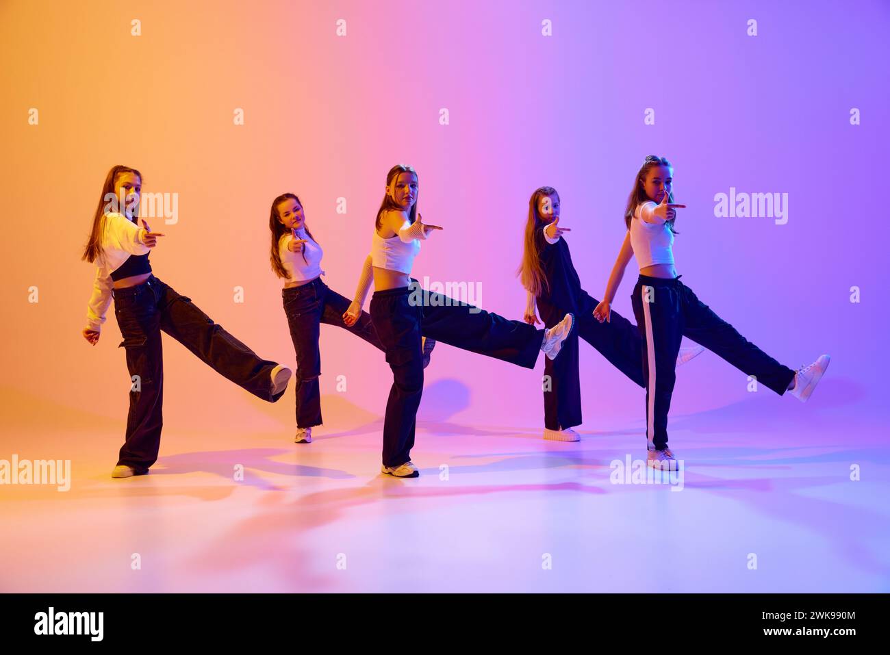 Dynamic image of teen girls training, dancing hip hop, contemporary ...