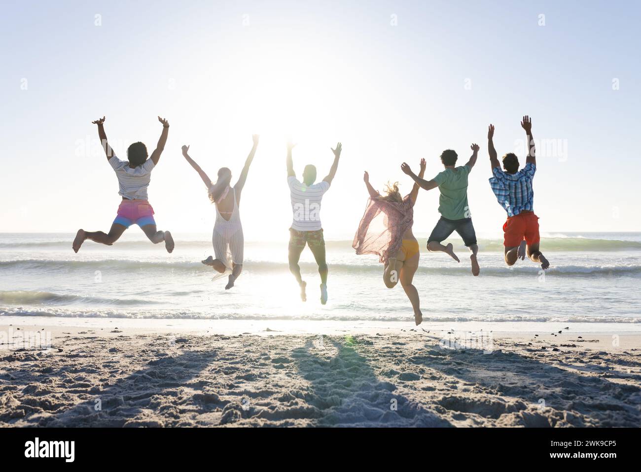 Group of people jumping into sea hi-res stock photography and images ...