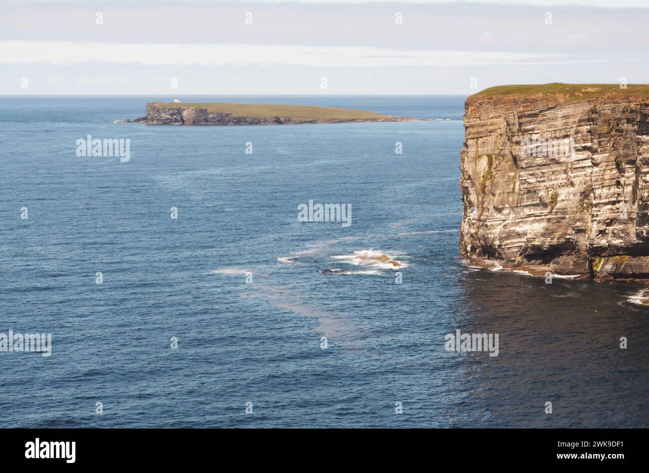 Marwick Head and on to Brough of Birsay, with the Atlantic ocean below ...