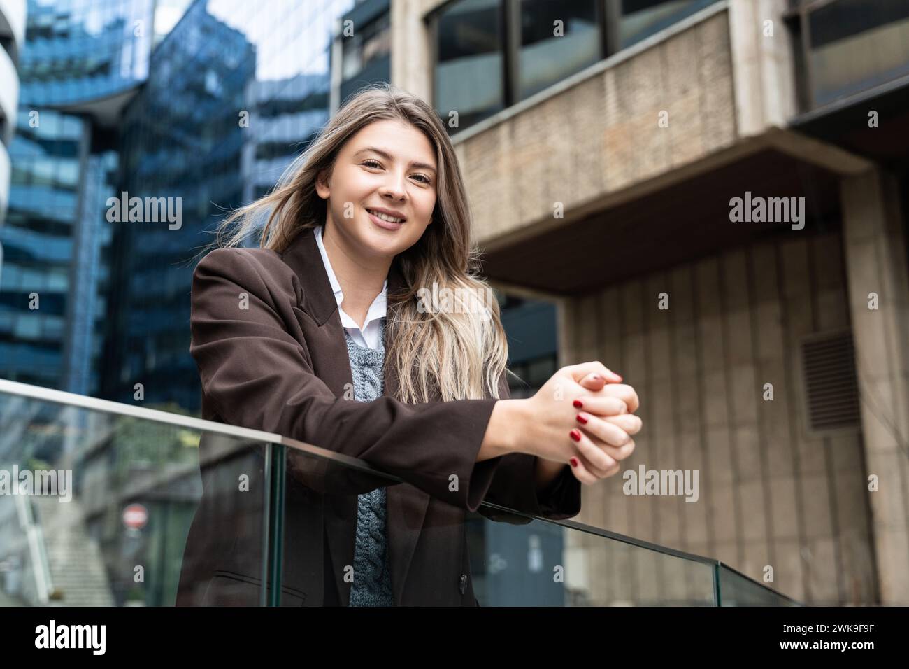 Portrait of young successful foreperson business woman outdoor. Cute ...