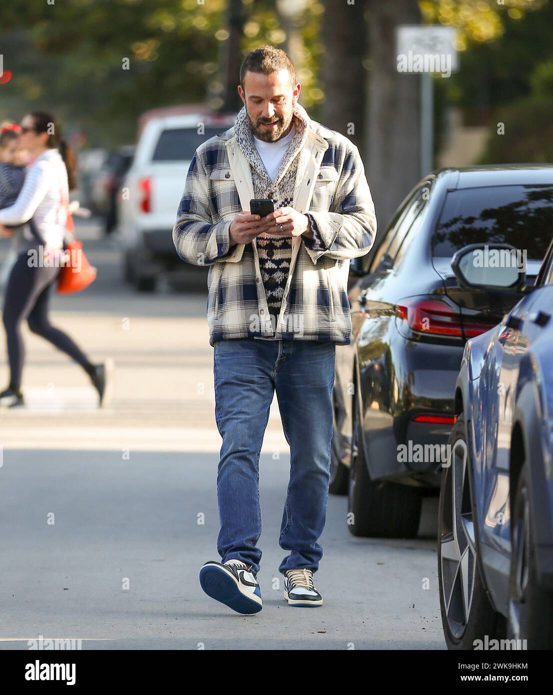 Ben Affleck checks his phone while out in the city. Featuring: Ben ...