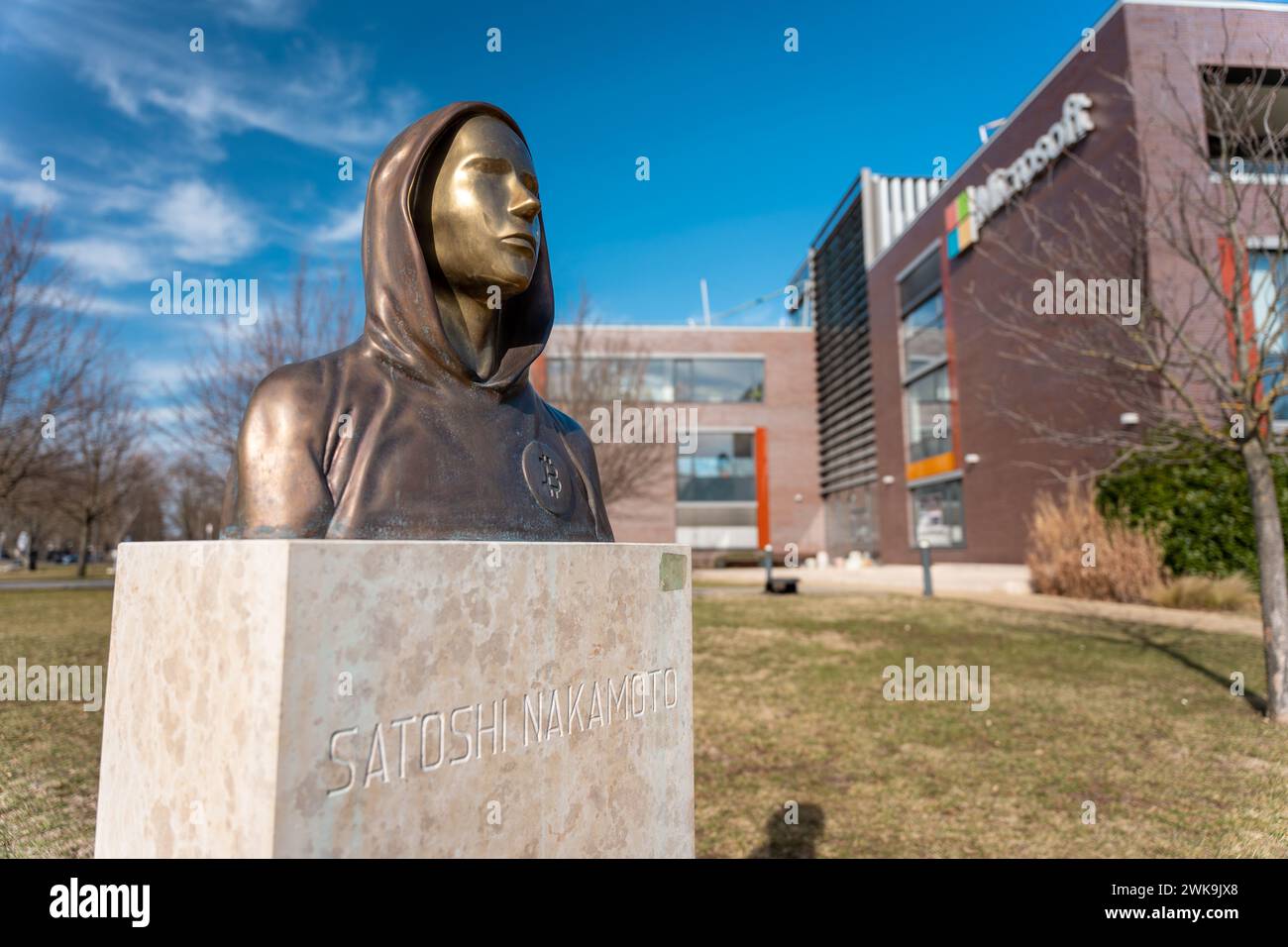Budapest, Záhony u. 7, Hungary - February 10, 2024: Statue of Satoshi ...