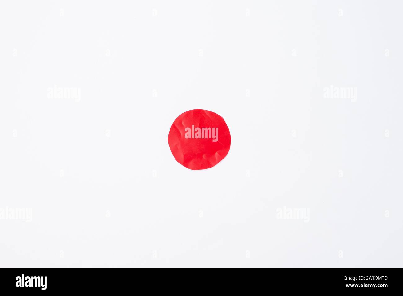 red circle on white paper background, handcrafted, top - view, round ...