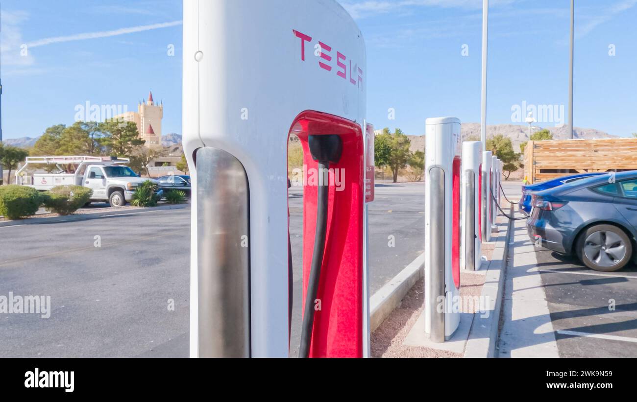 Daytime Tesla Charging: Supercharging Station Power-Up Stock Photo - Alamy
