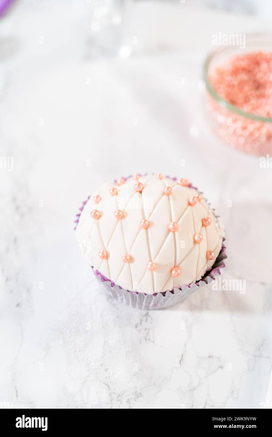 Creating Extravagant Cupcakes for Birthday Celebration Stock Photo - Alamy