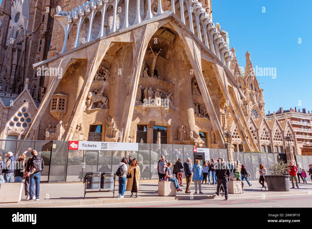 Barcelona, tourists in front of Sagrada Familia entrance. Tourists ...